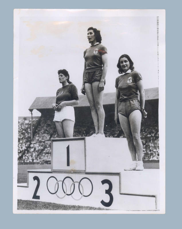 Photograph of women's discus athletes on victory dais, 1948 Olympic ...