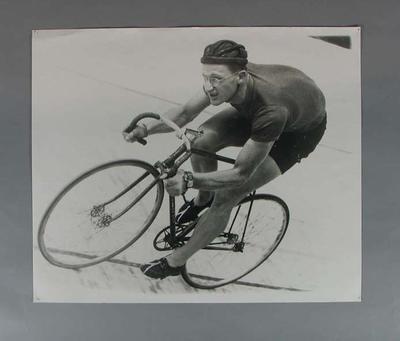 Photograph of Russell Mockridge cycling, c1950s - Australian Sports Museum