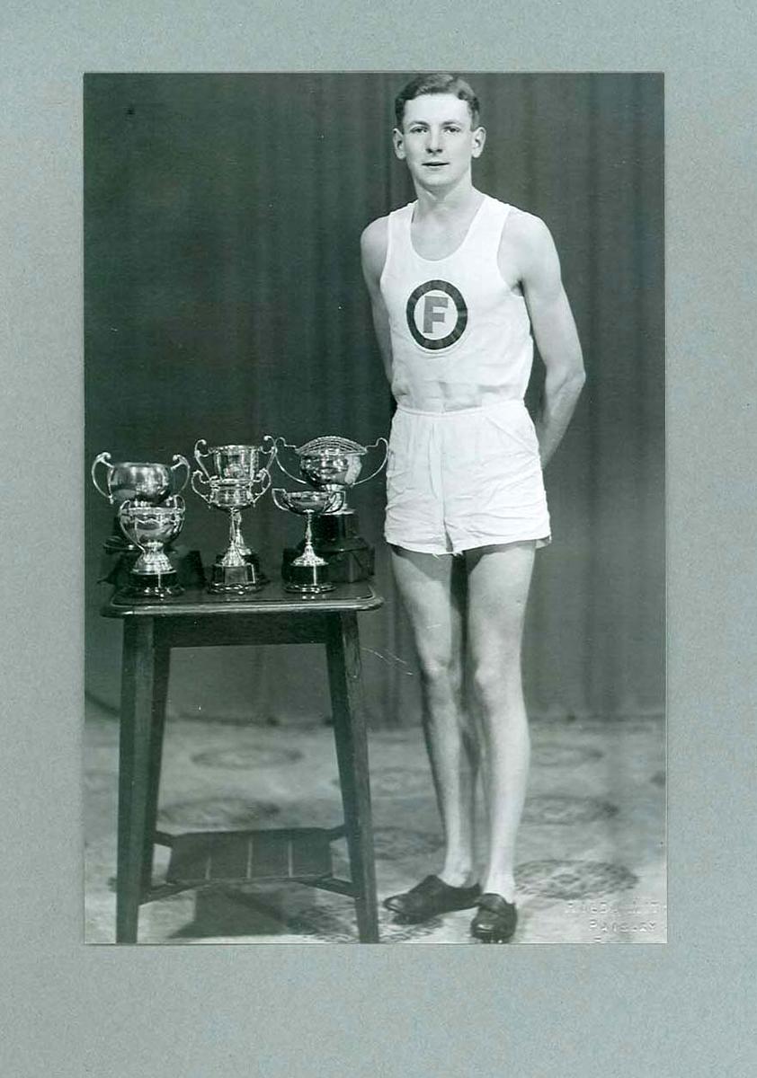 Photograph of runner William Ager with trophies, Footscray Harriers ...
