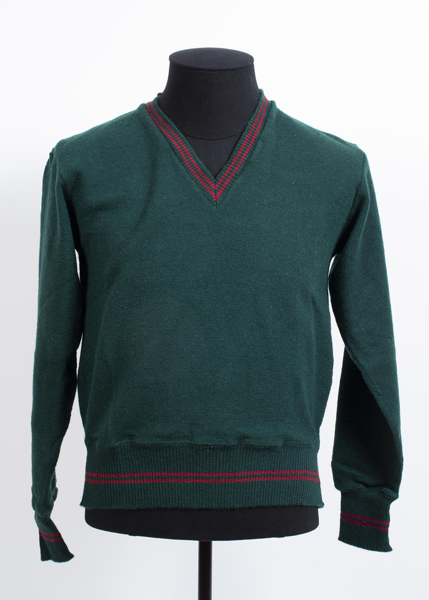 Green and red jumper worn by Clive Churchill - Australian Sports Museum
